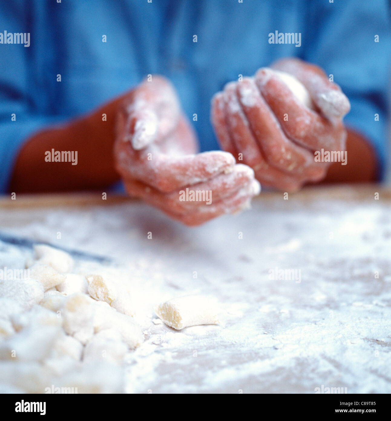 Hands covered in flour hi-res stock photography and images - Alamy
