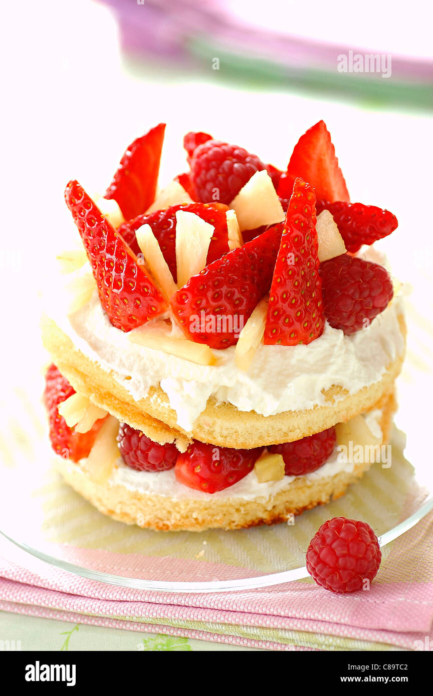 strawberry cream sponge dessert with raspberries and pineapple Stock ...