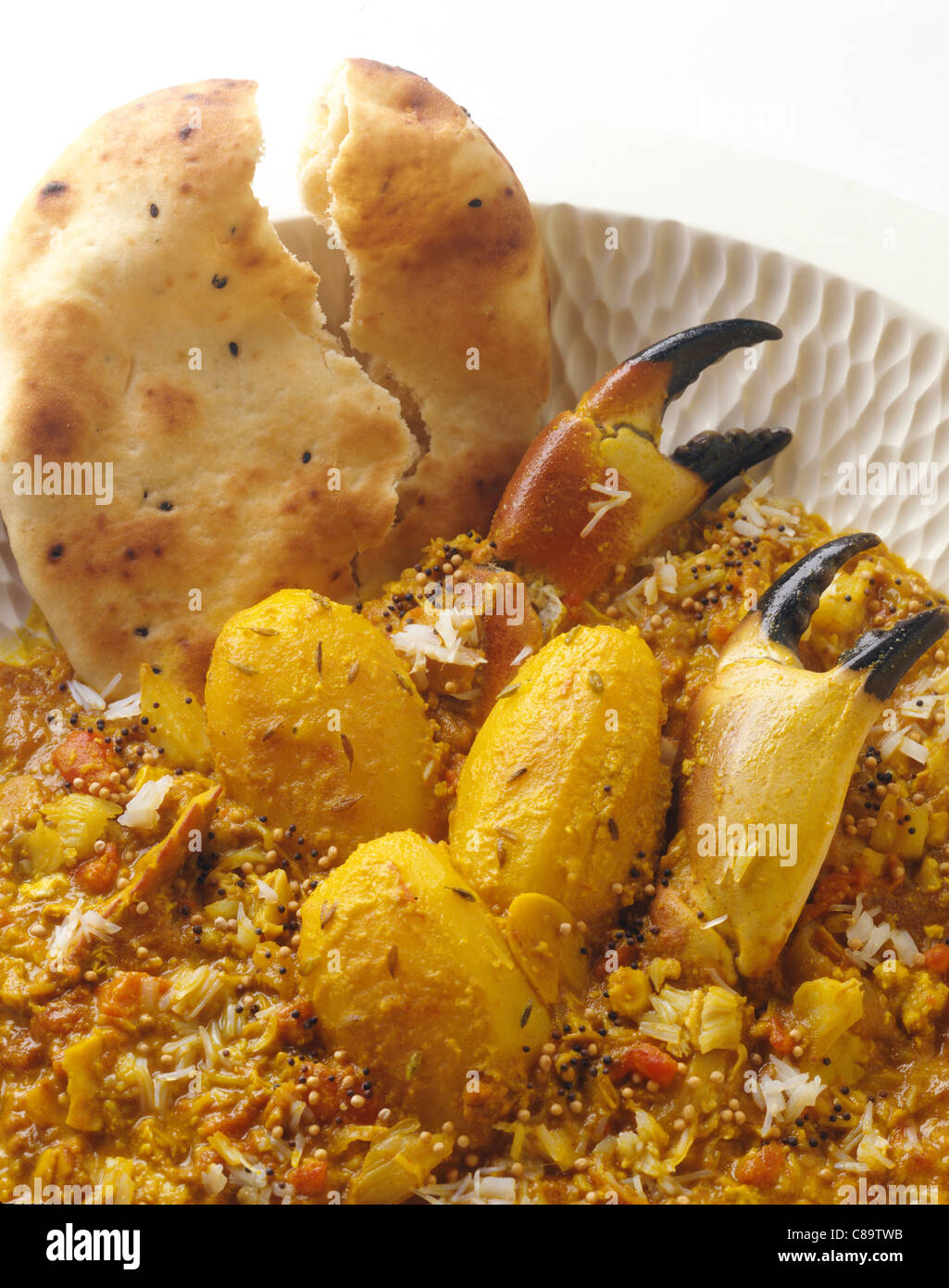 Crab curry and flat bread Stock Photo - Alamy