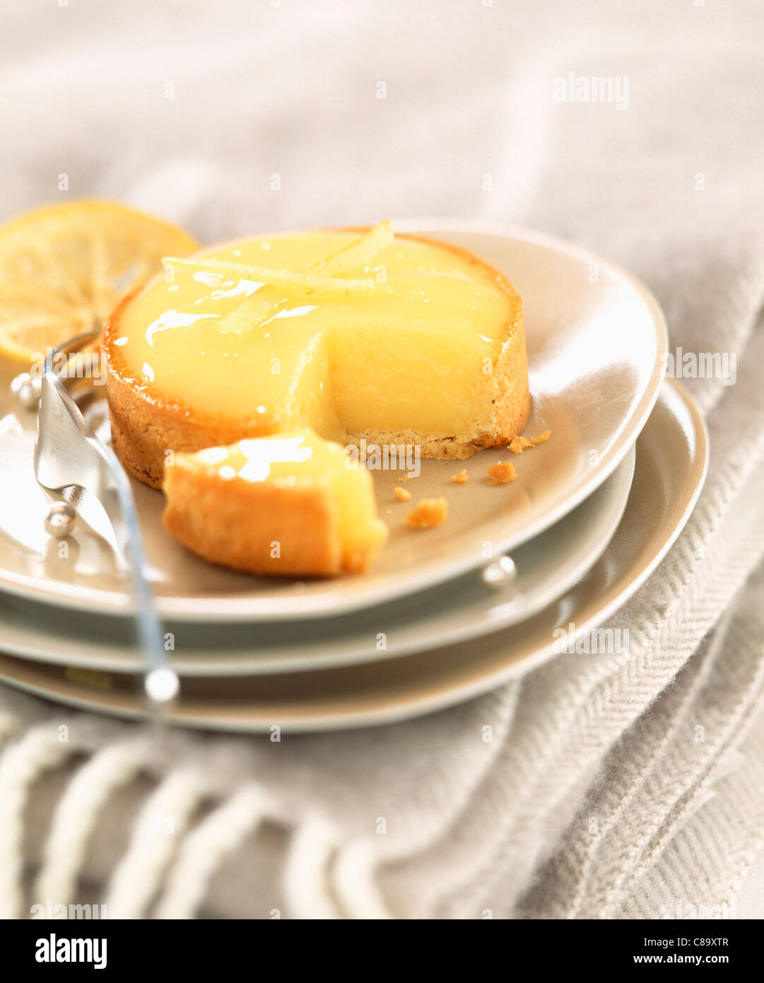 Individual lemon tarts Stock Photo - Alamy