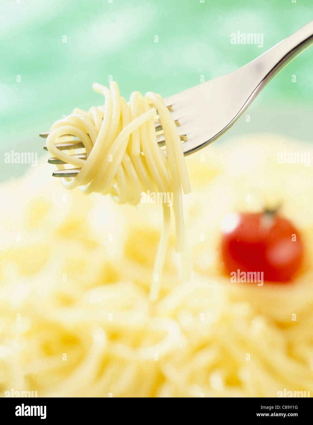 Plain spaghetti and fork Stock Photo - Alamy