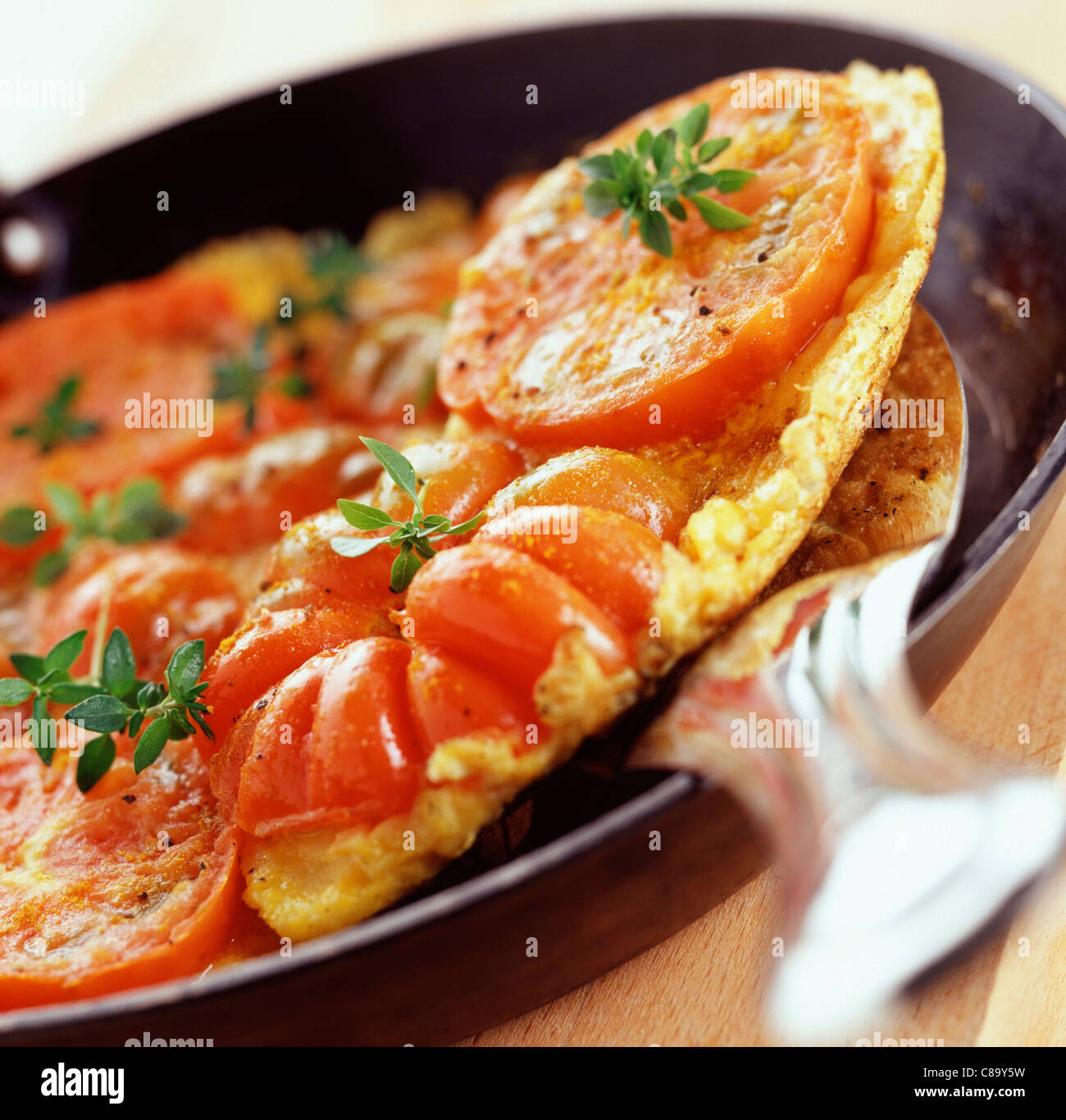 Open tomato and vinegar omelette Stock Photo - Alamy