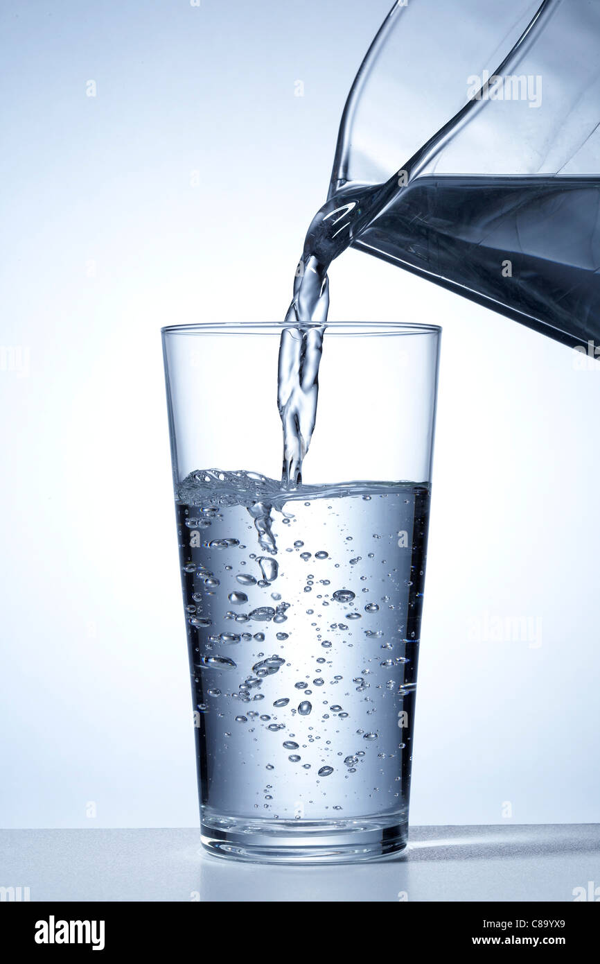 Jug pouring water glass hi-res stock photography and images - Alamy