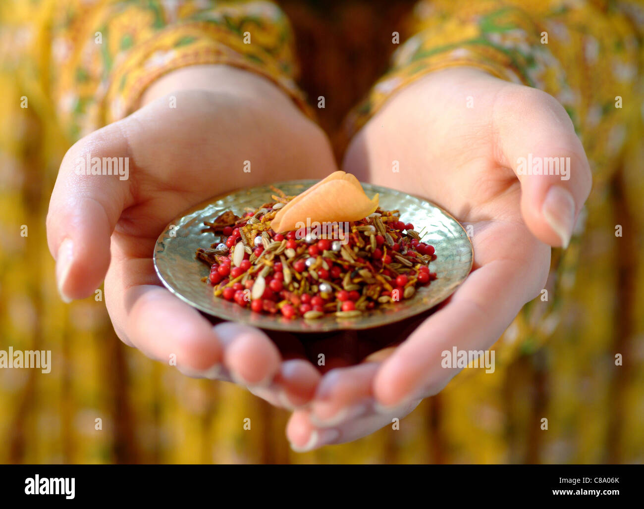 hands holding bowl of spices Stock Photo - Alamy