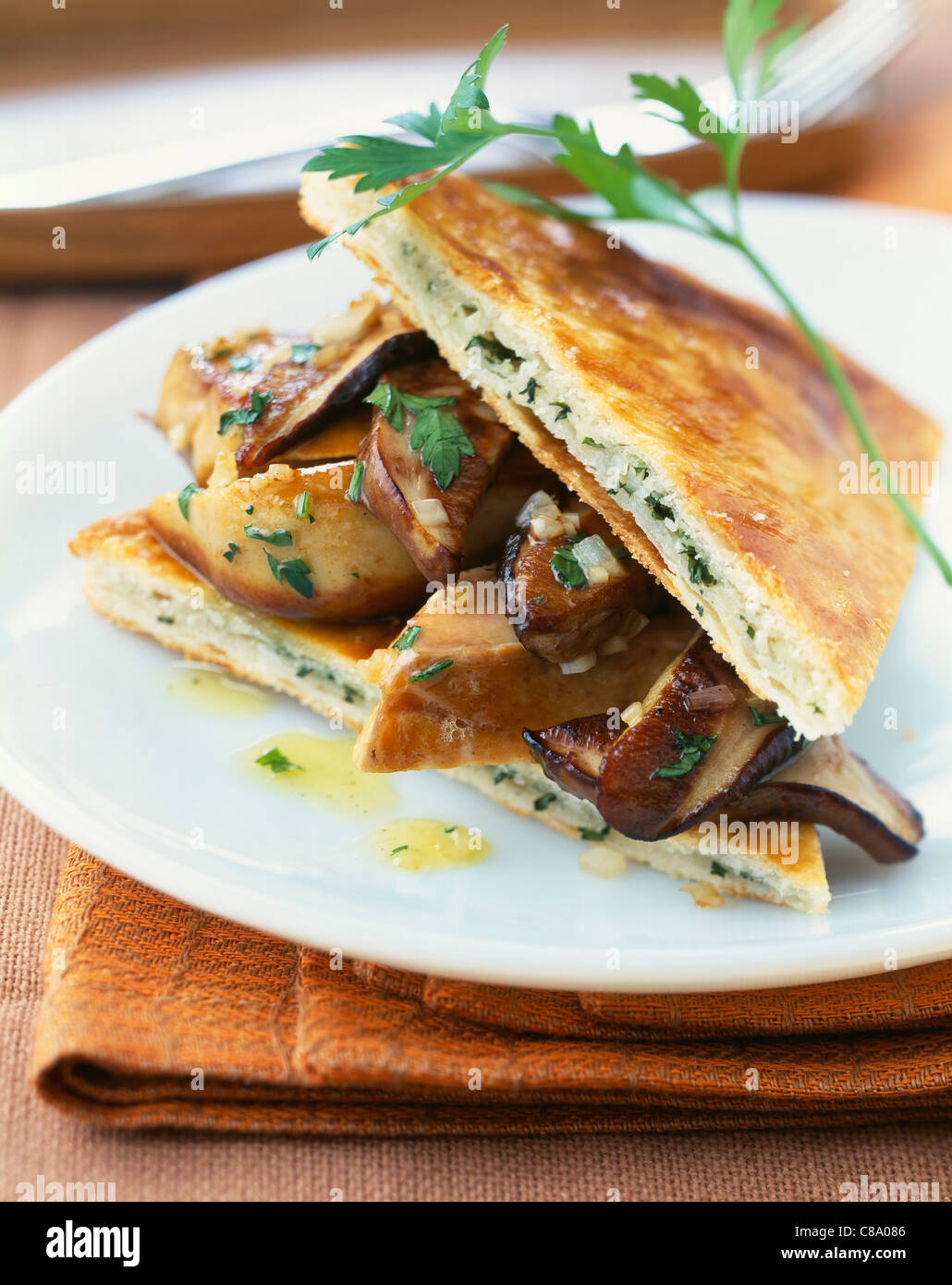 Pan-fried foie gras and ceps with parsley-flavored pastry triangles ...