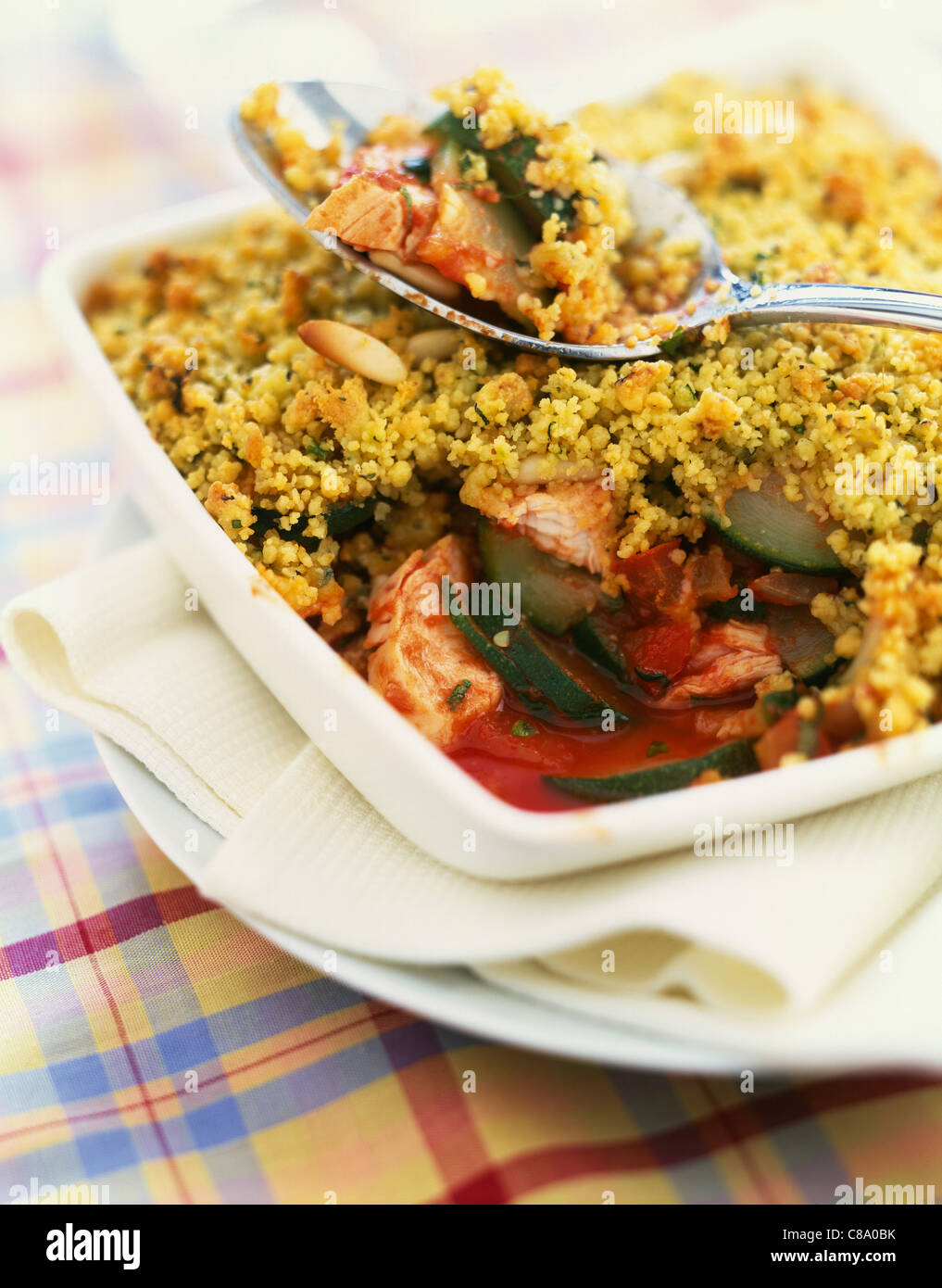 Chicken and summer vegetable semolina crumble Stock Photo - Alamy