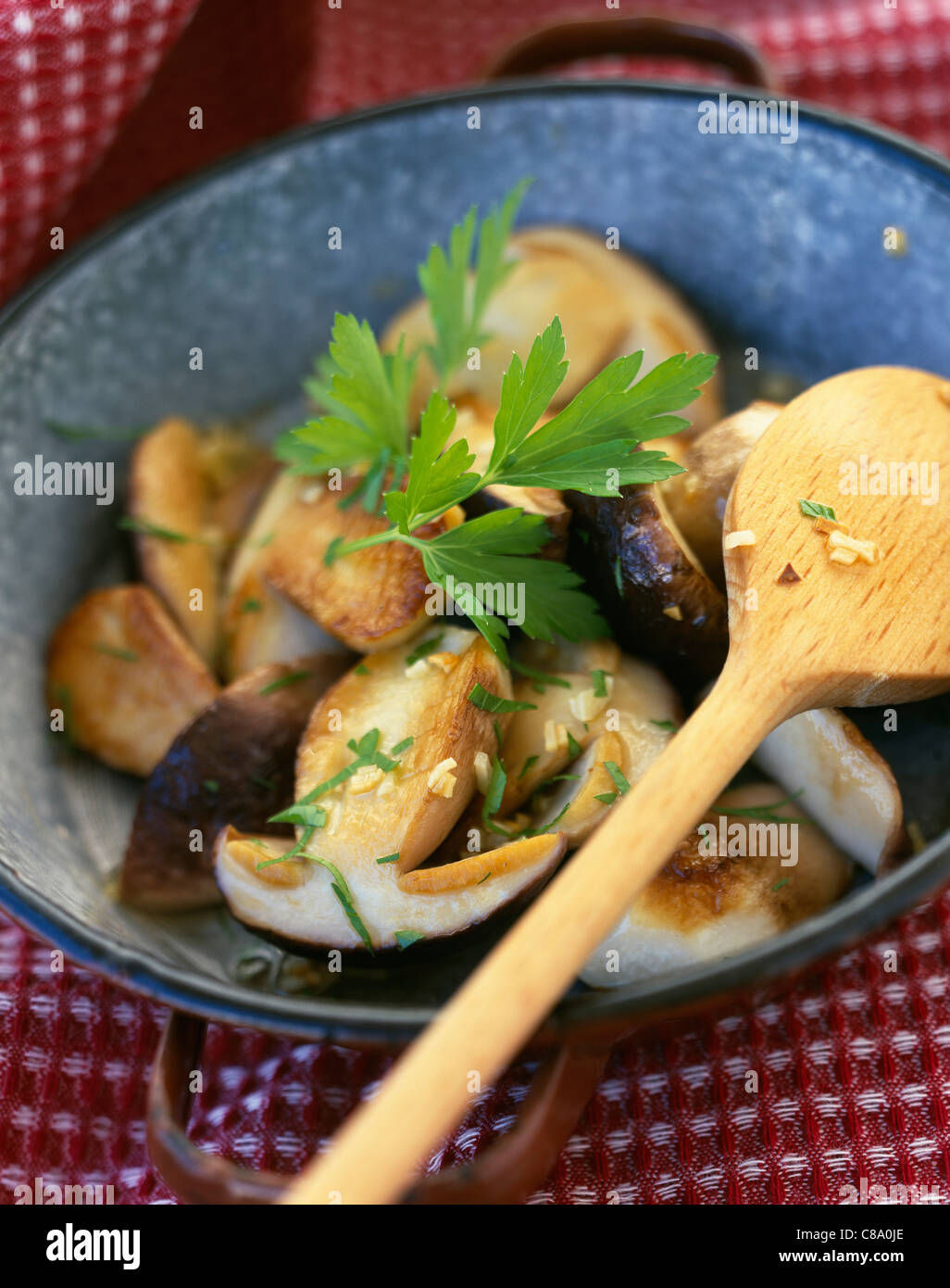 Pan-fried young ceps with garlic Stock Photo - Alamy