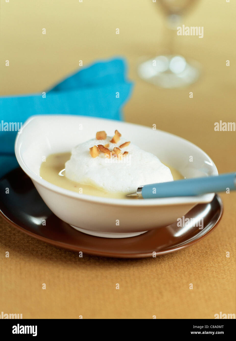 Chestnut flavored floating island Stock Photo - Alamy