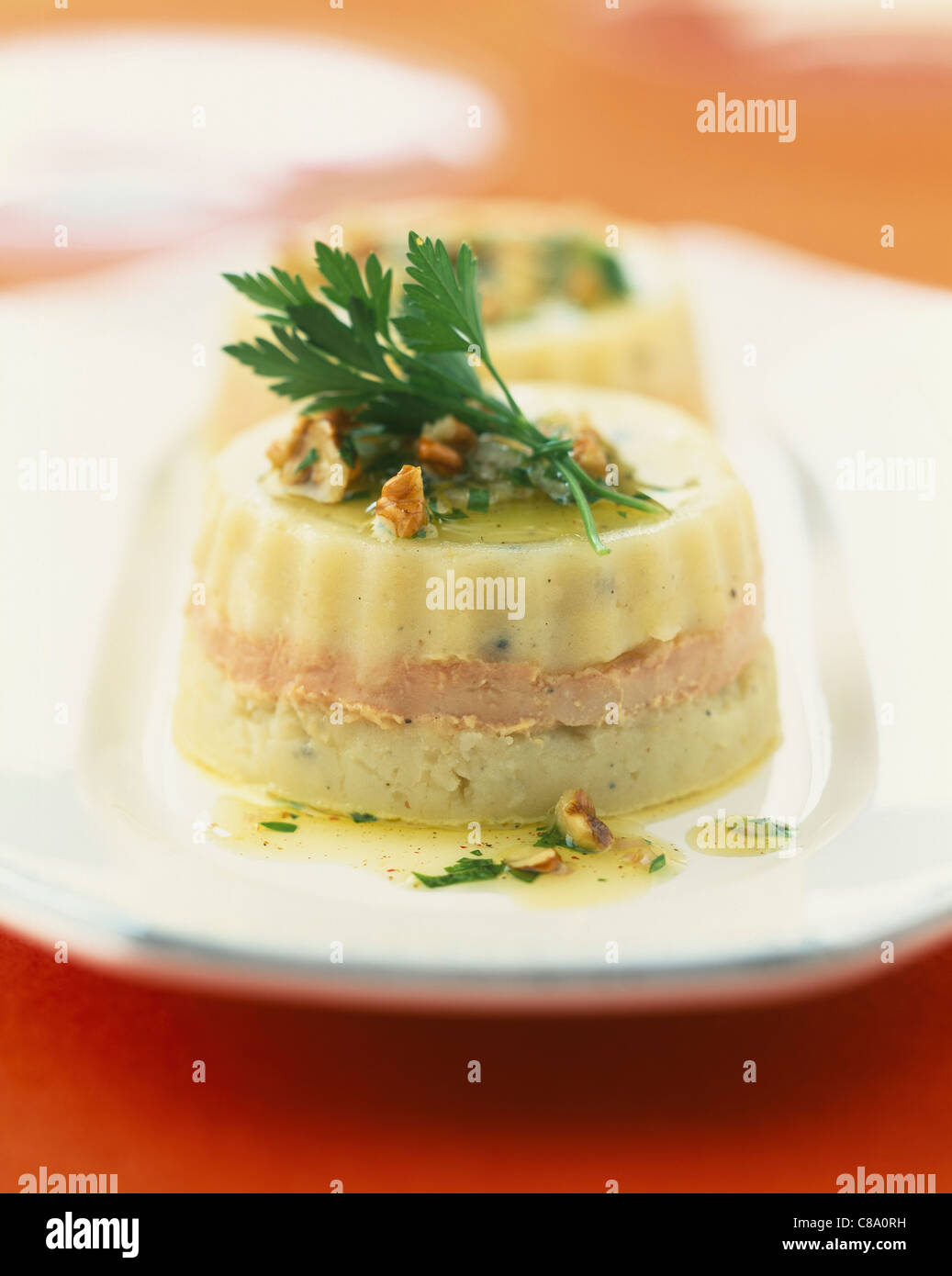 Potato and foie gras timbale Stock Photo - Alamy