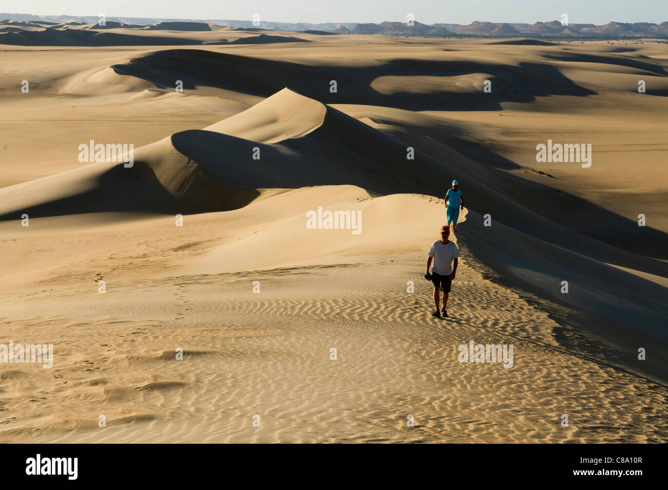 Travelers in the Saharan Desert near Siwa Oasis in Egypt Stock Photo ...