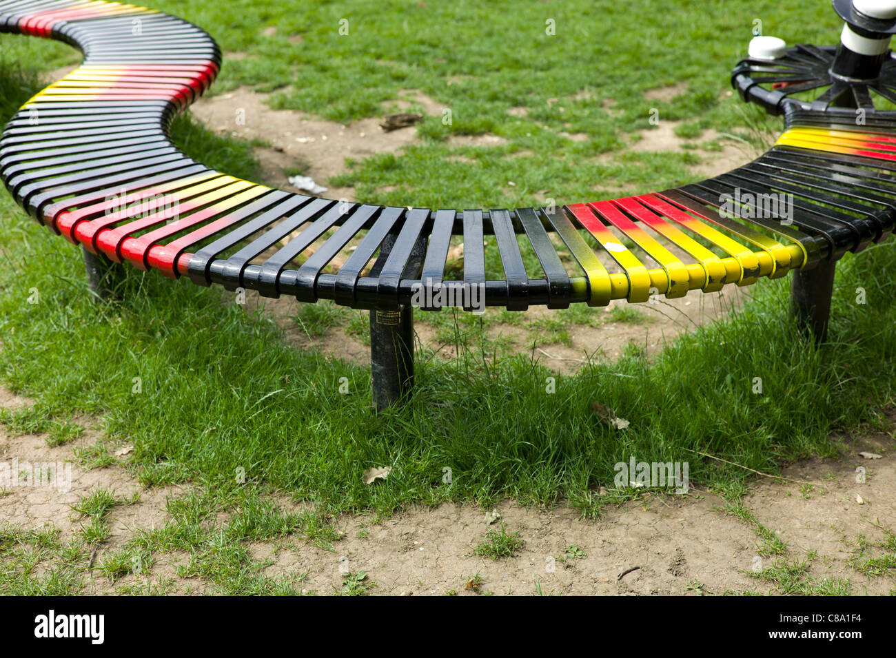 Children's playground, close shot of snake bench Stock Photo - Alamy