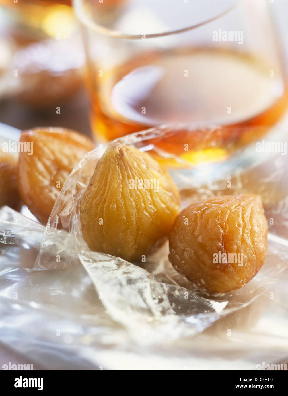 Rum-flavored candied chestnuts Stock Photo - Alamy