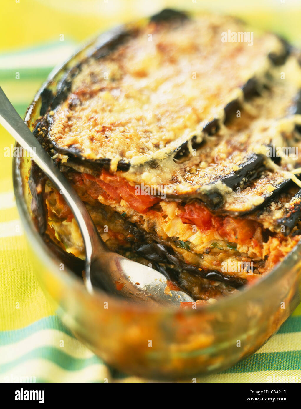 Cod and eggplant cheese-topped dish Stock Photo - Alamy