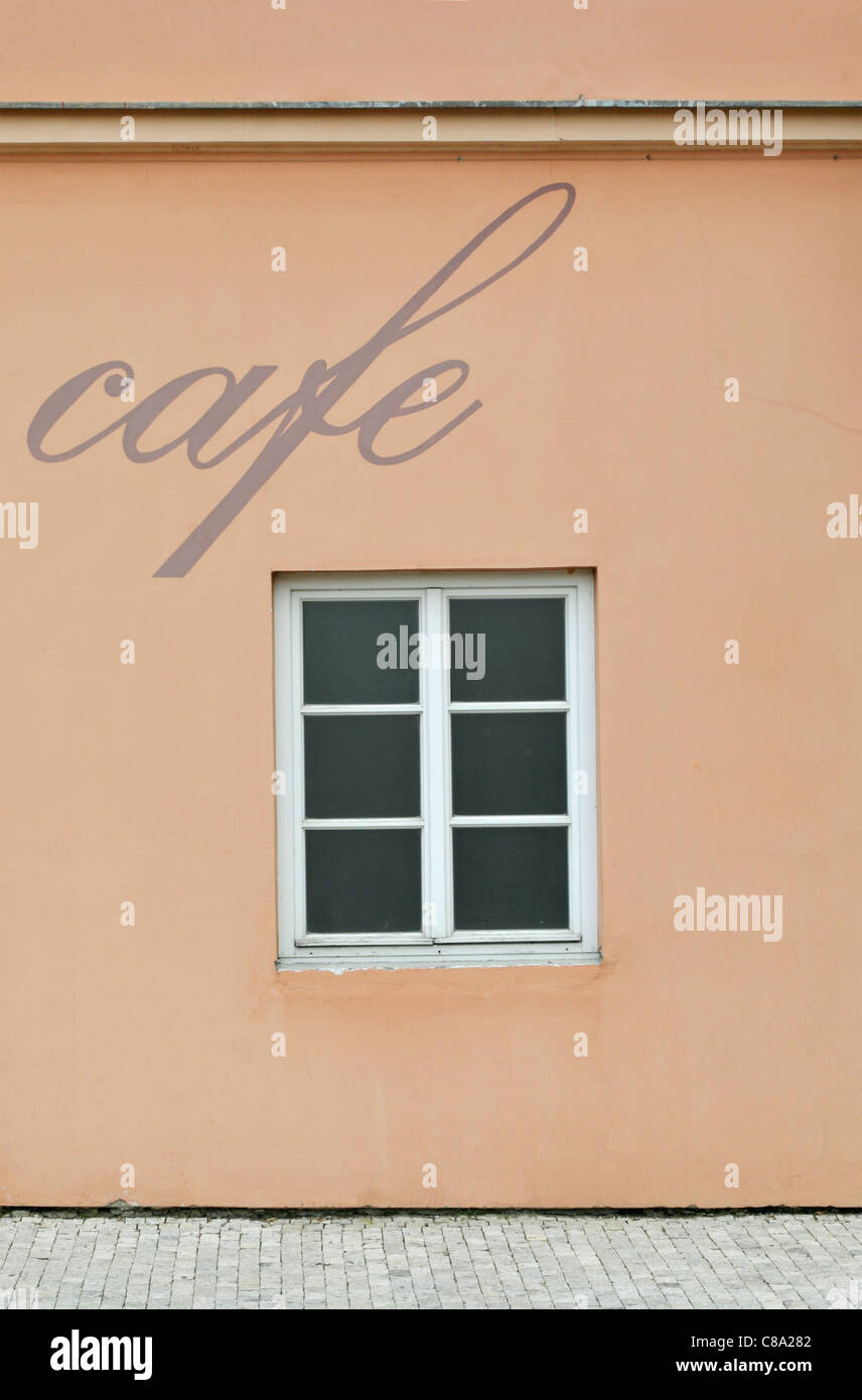 window and cafe sign painted on wall Stock Photo - Alamy