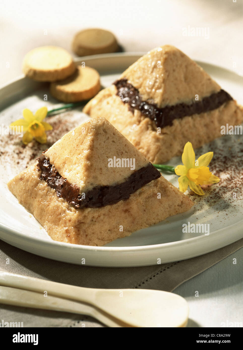 Macaroon mousse pyramids Stock Photo - Alamy