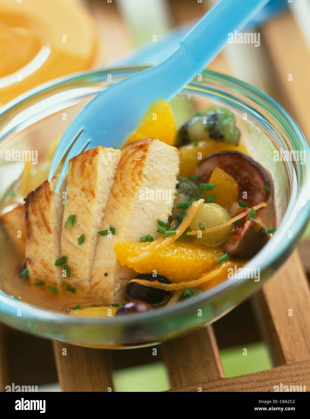 Half-cooked pieces of swordfish with exotic fruit Stock Photo - Alamy