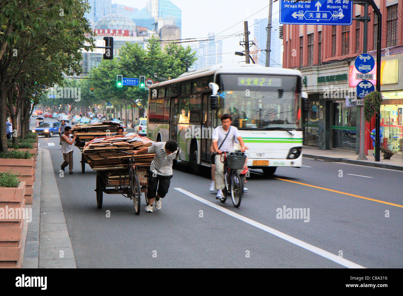 Man pulling cart hi-res stock photography and images - Alamy