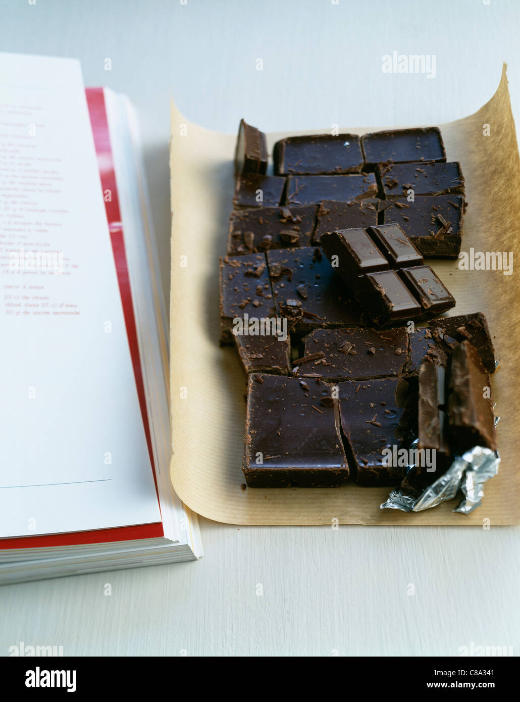 Broken bar of chocolate Stock Photo - Alamy