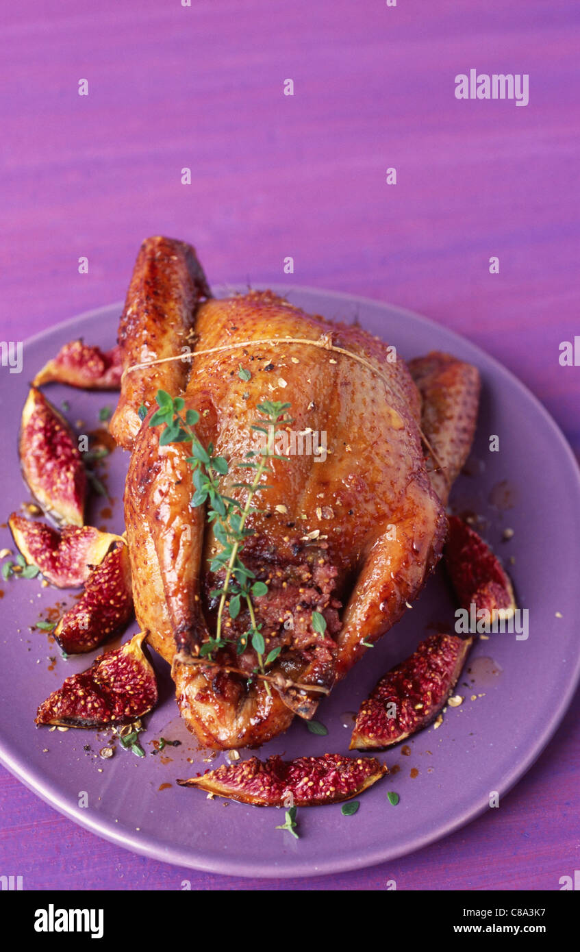 Stuffed young pigeon with figs Stock Photo - Alamy