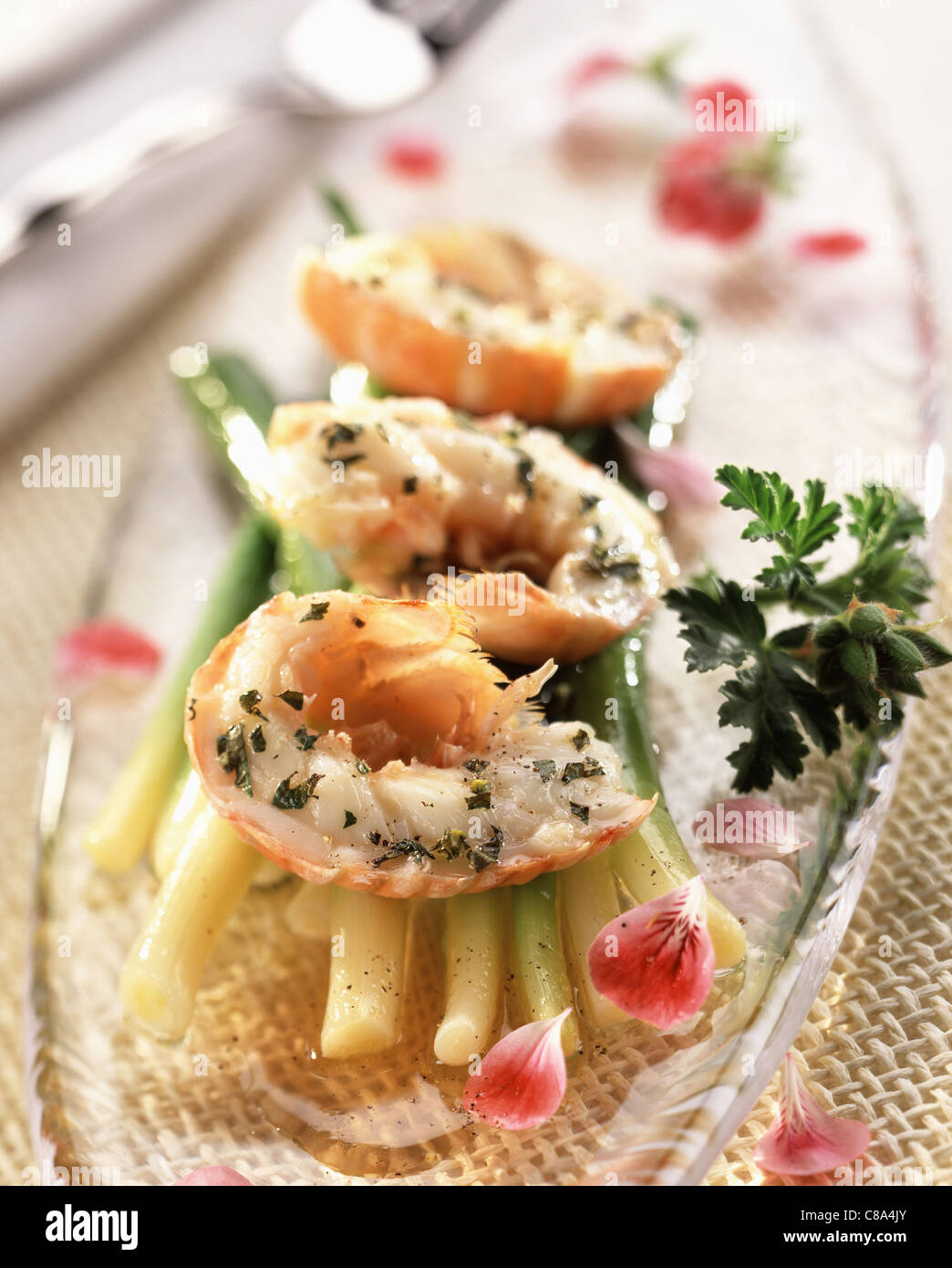 Dublin Bay prawns with geranium petals Stock Photo - Alamy