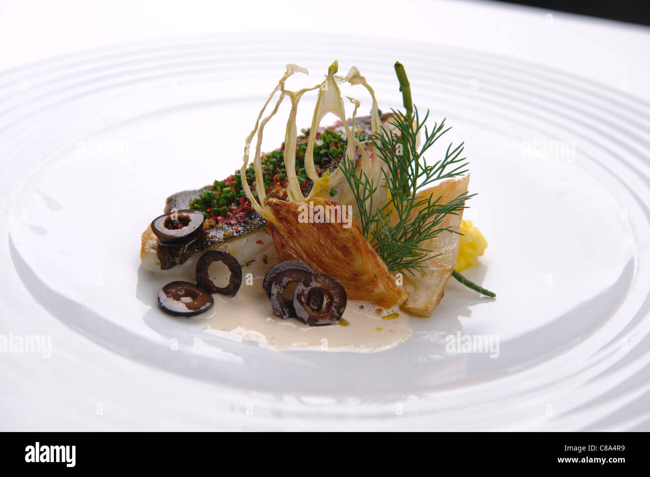 Nouvelle cuisine gourmet fish dish Stock Photo - Alamy
