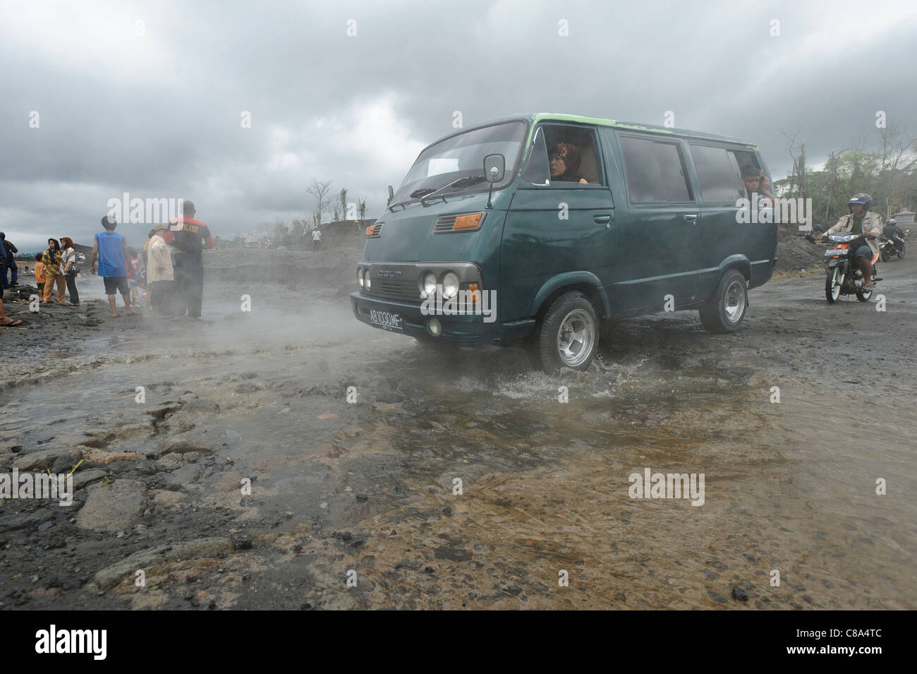 Crossing the Gendol river which flows through the remains of a ...
