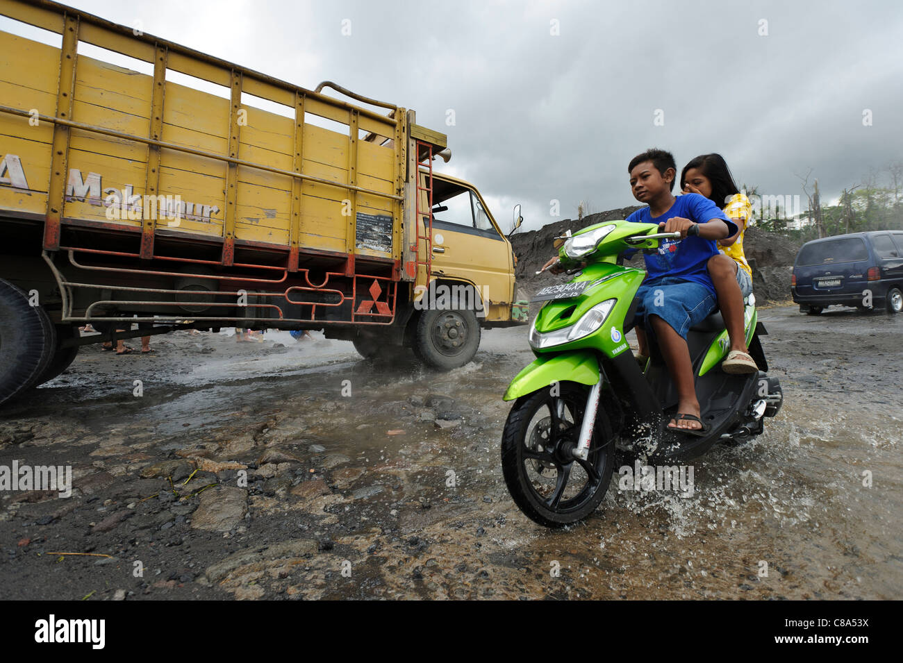 Crossing the Gendol river which flows through the remains of a ...