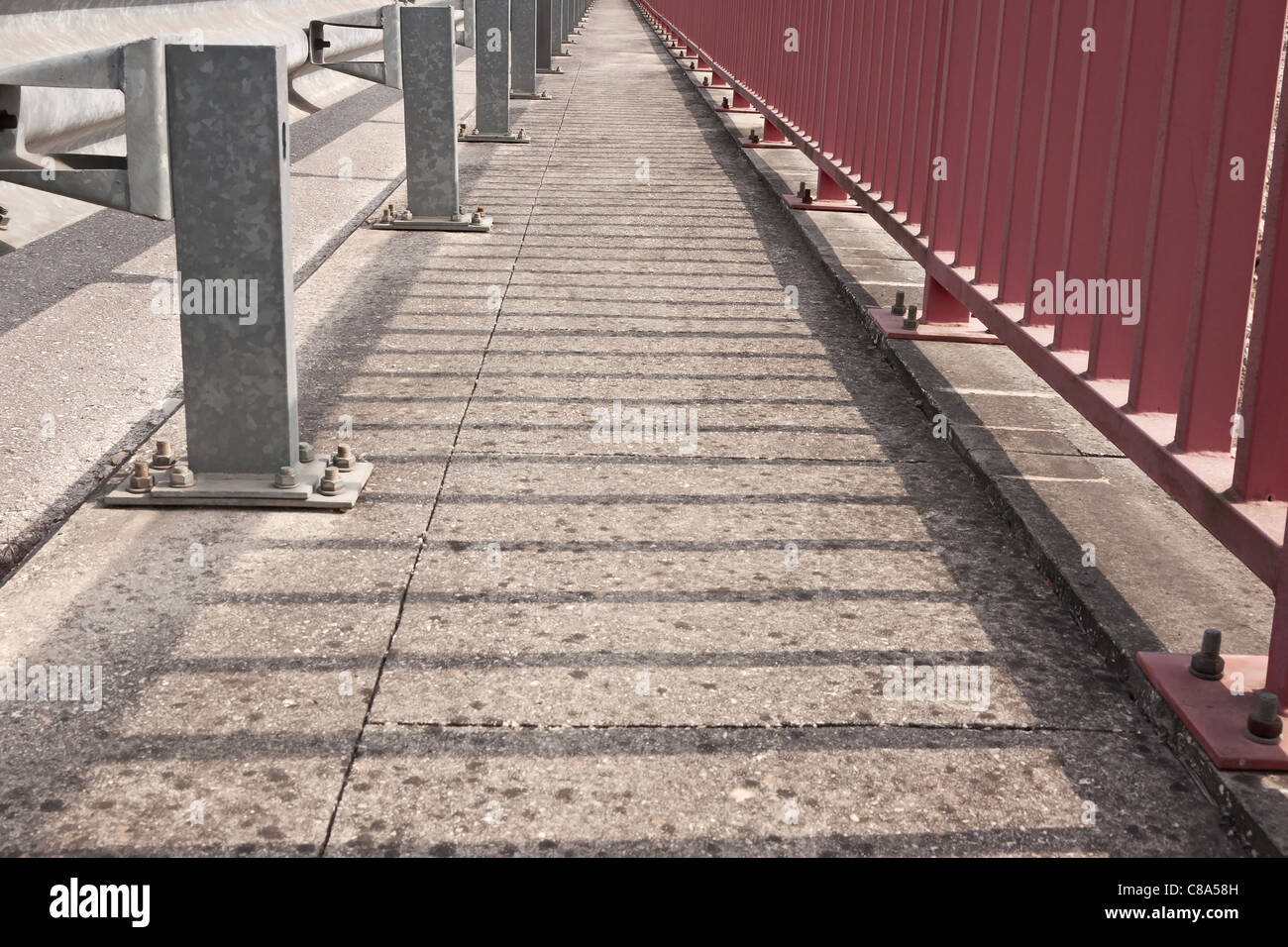 Convergence view of Pedestrian Walkway in a bridge Stock Photo - Alamy