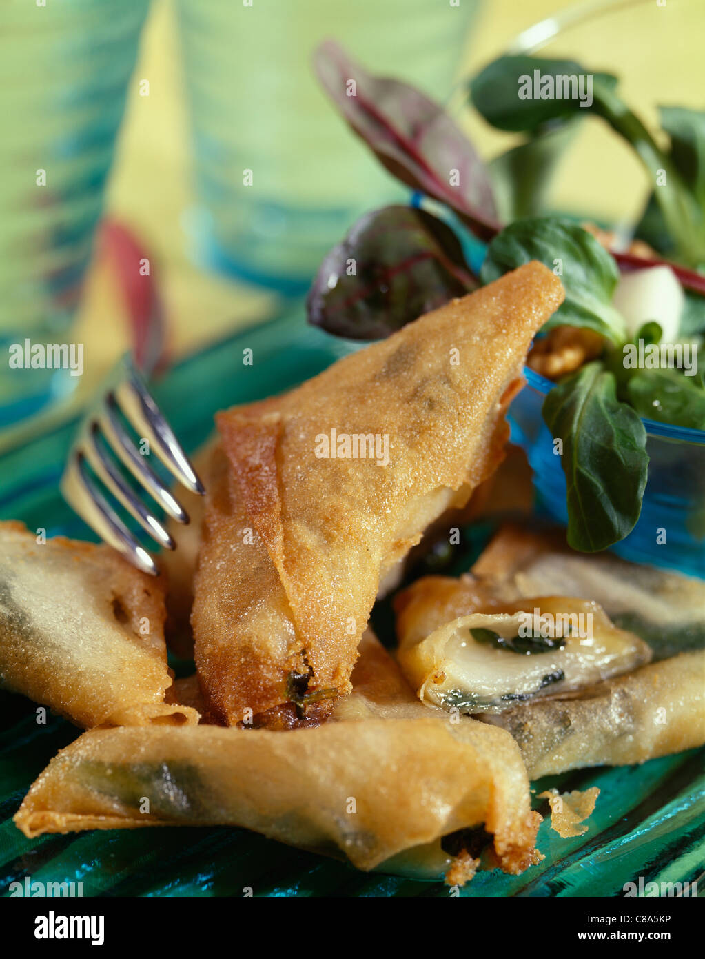 Camembert and pear fried filo pasty turnovers Stock Photo - Alamy
