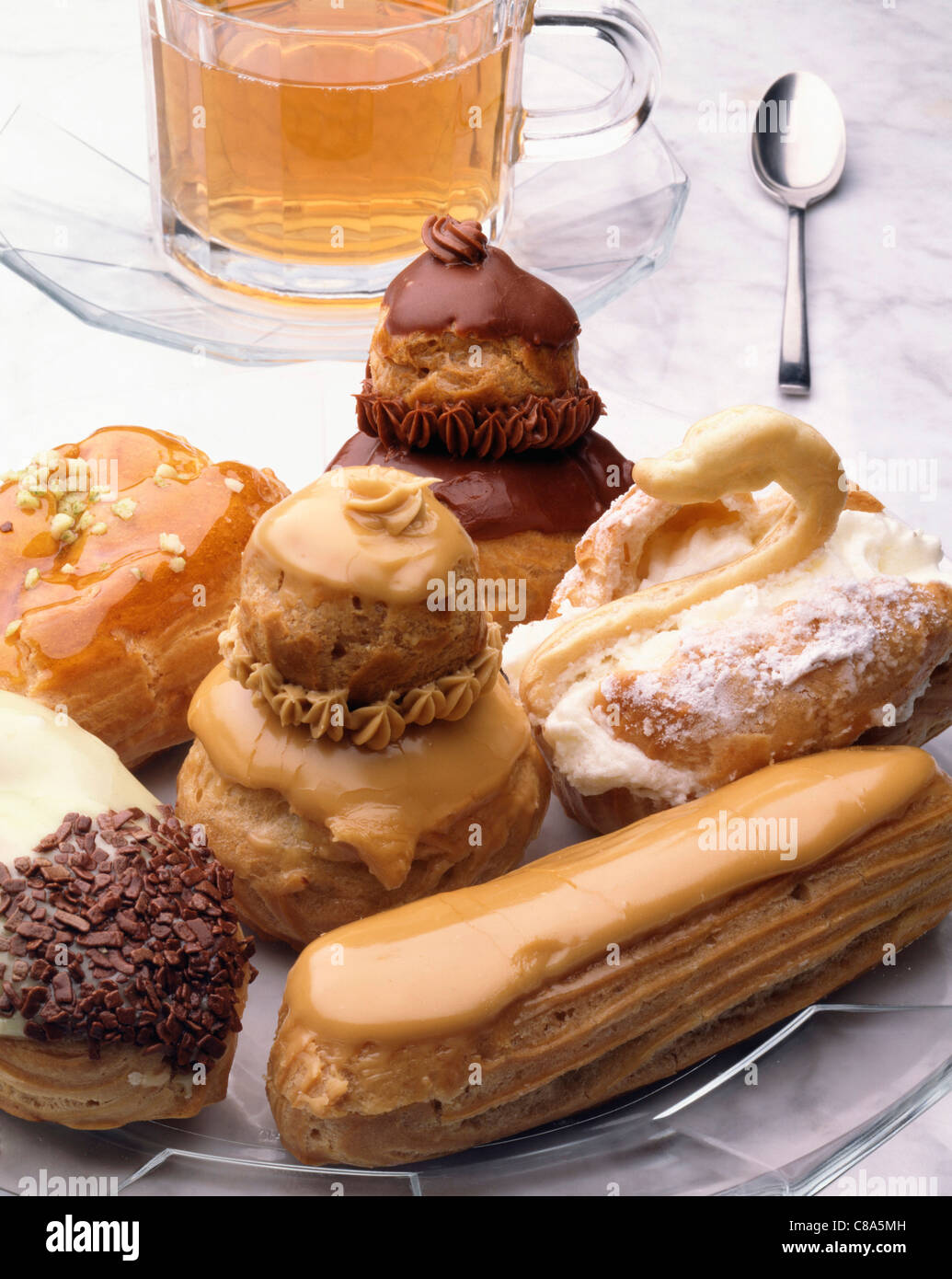 Individual cream cakes Stock Photo - Alamy