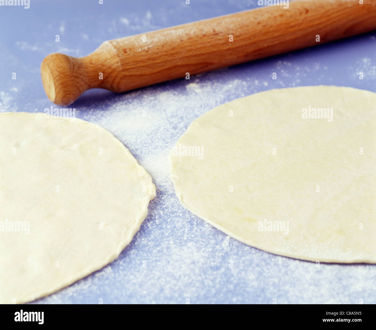 Spreading out the flaky pastry Stock Photo - Alamy