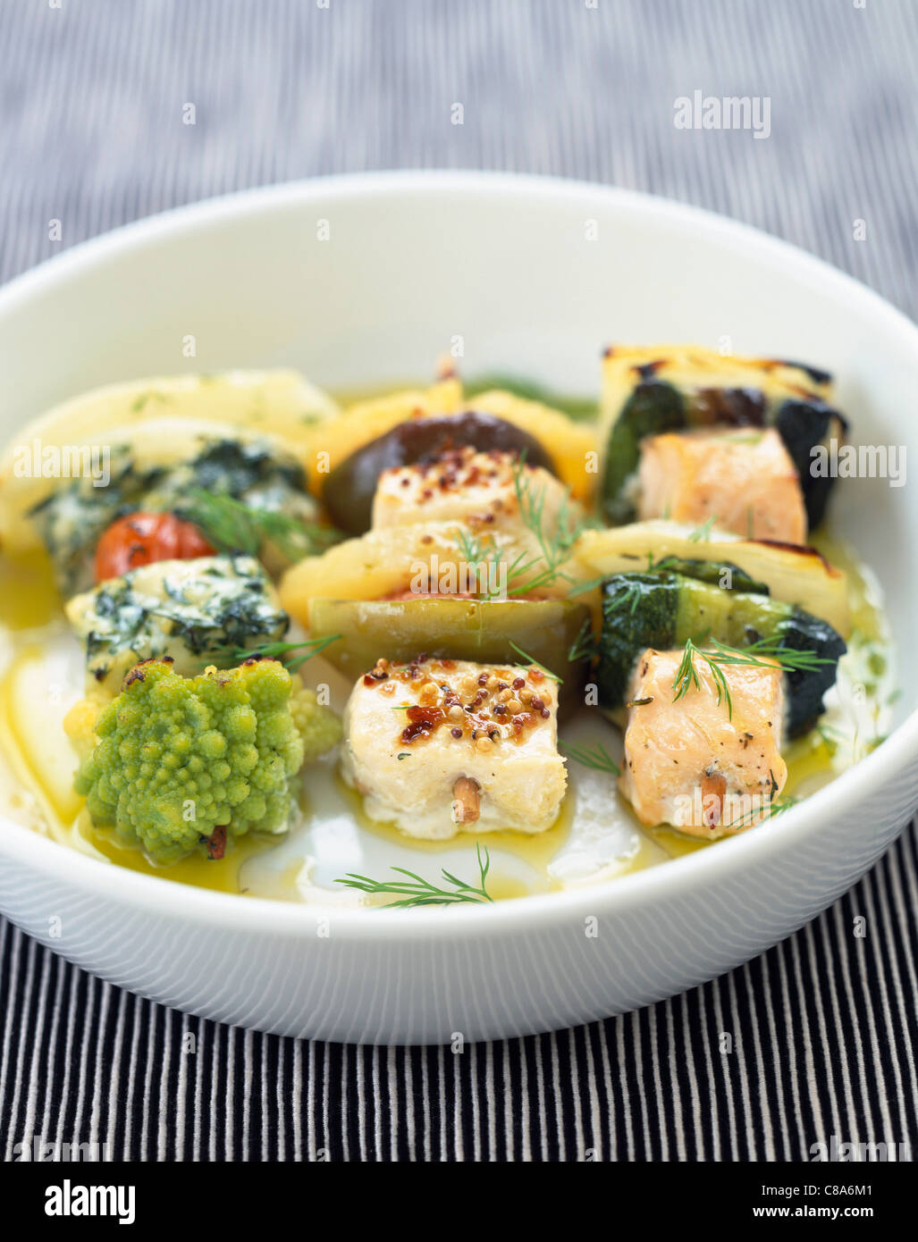 assorted fish and green vegetable brochettes Stock Photo - Alamy