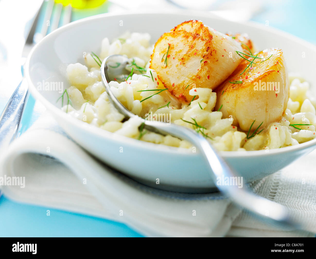 Risotto with scallops Stock Photo - Alamy