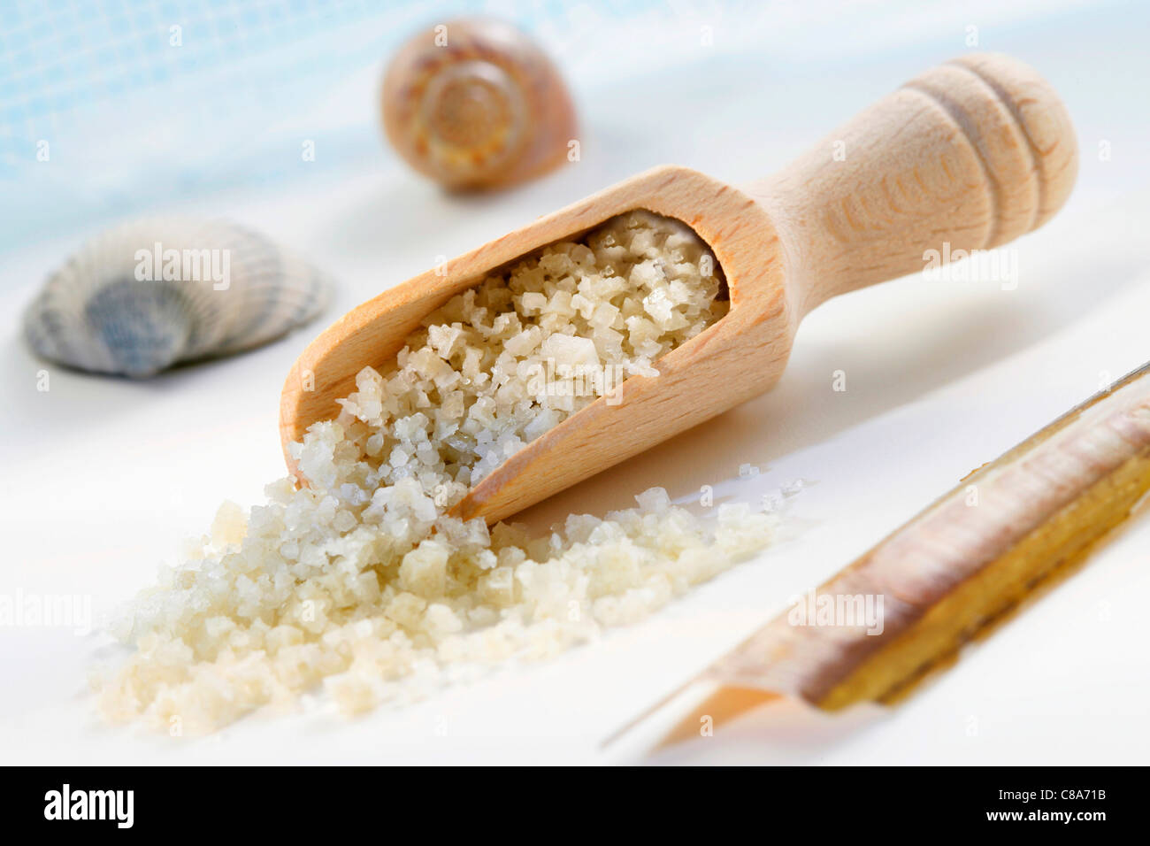 Little shovel of coarse salt and shells Stock Photo - Alamy