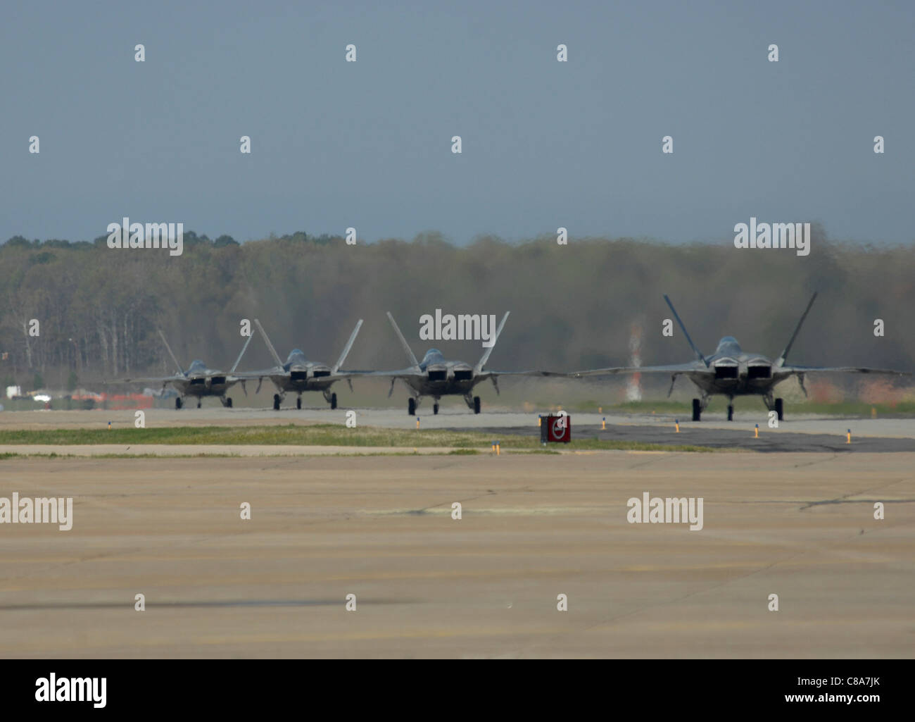 F-22 Raptors taxi April 10, 2011, during an operational readiness ...