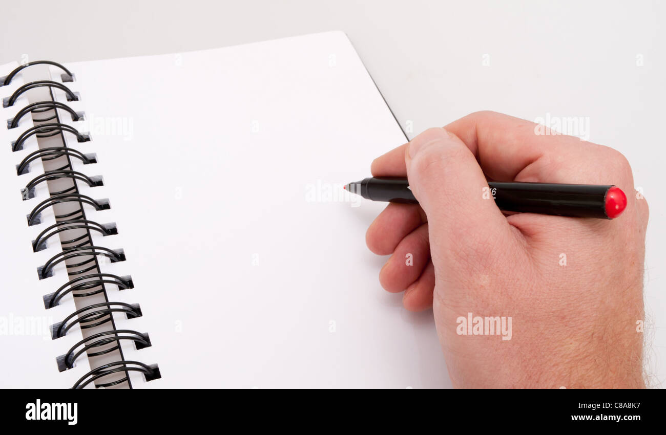 Close up of Hand With Red Marked - Open Notebook- Personal Organizer ...
