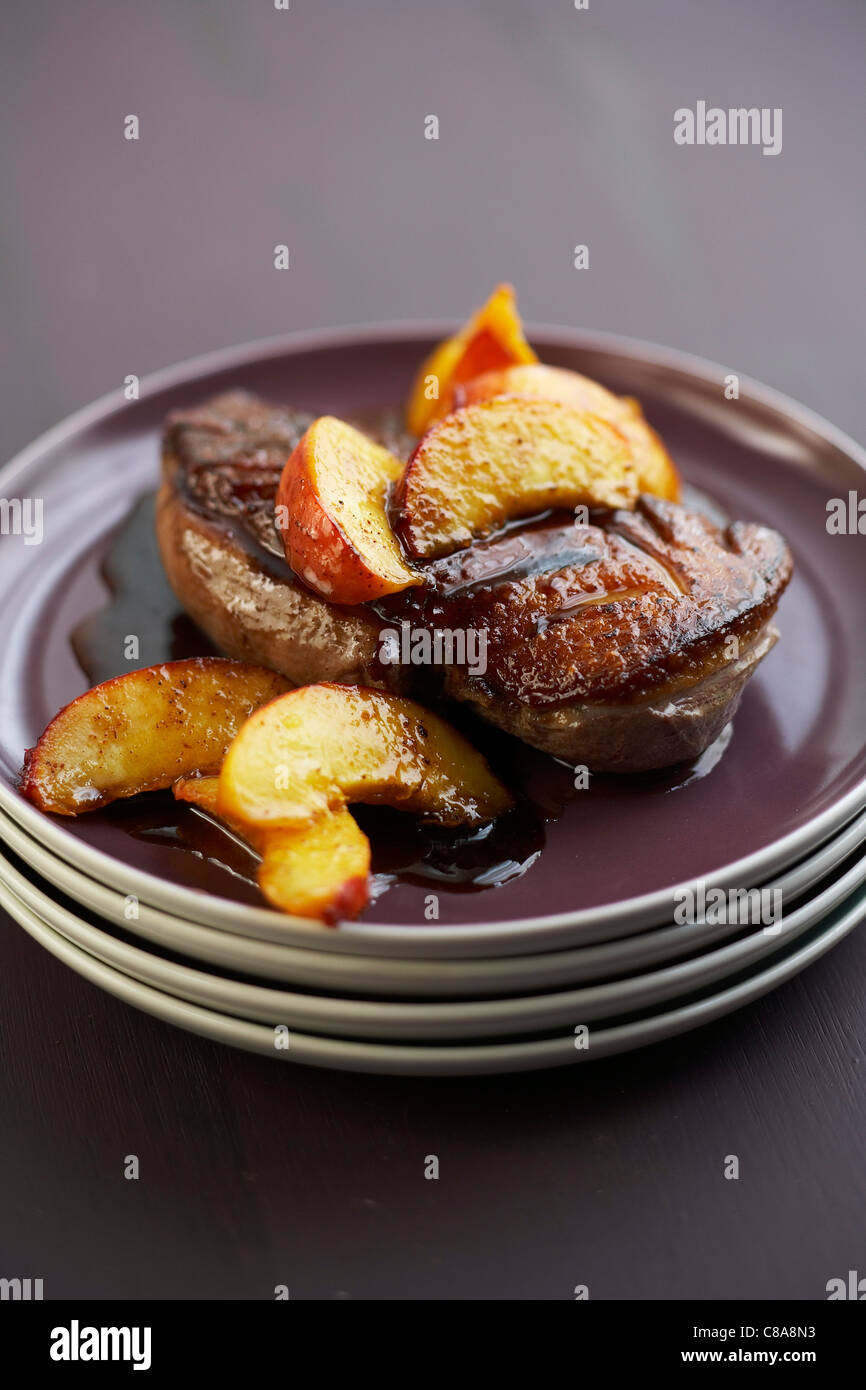 Duck Magret with roast peaches Stock Photo - Alamy