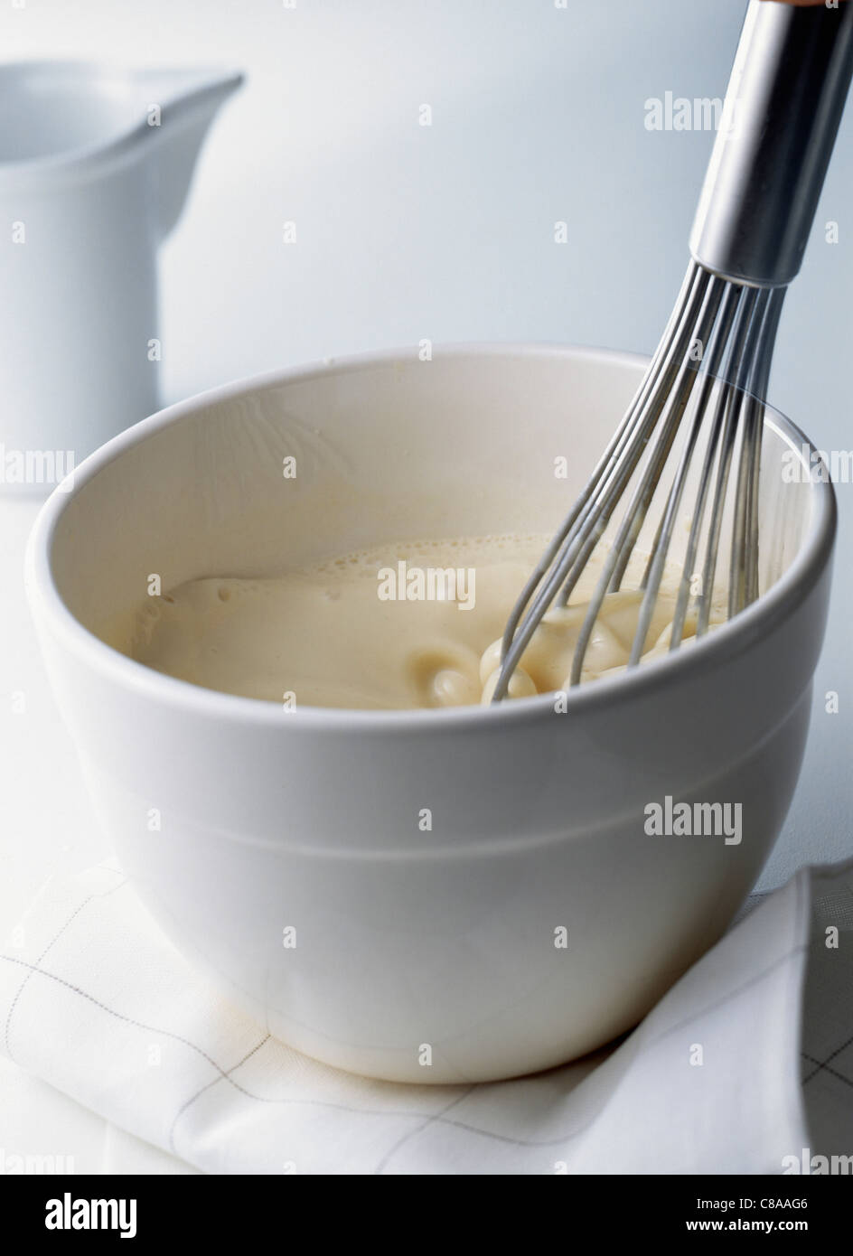 Preparing common wheat pancake mixture Stock Photo - Alamy
