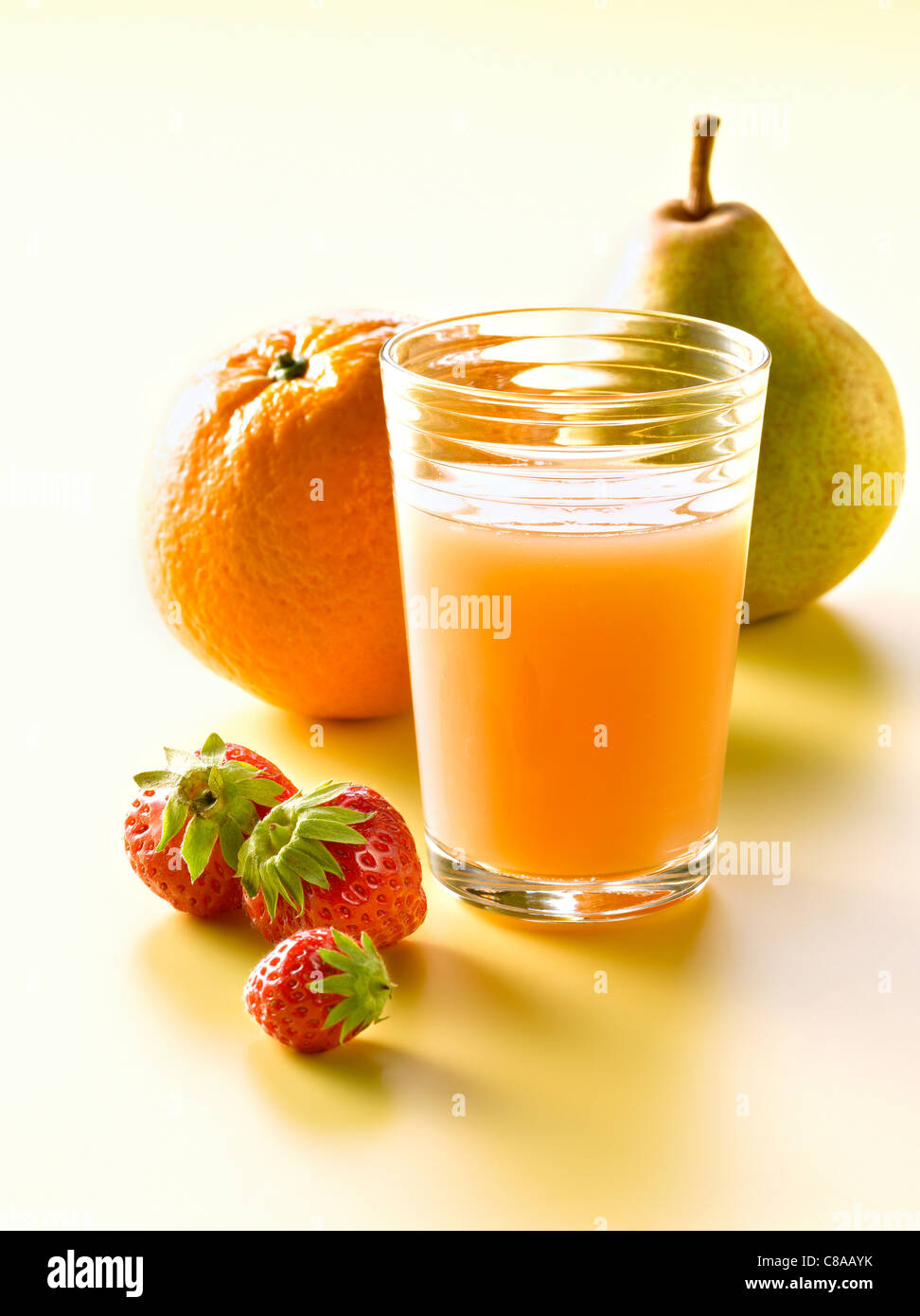 Glass of fruit juice Stock Photo - Alamy