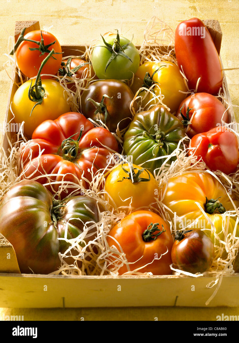 Crate of old-fashionned tomatoes Stock Photo - Alamy