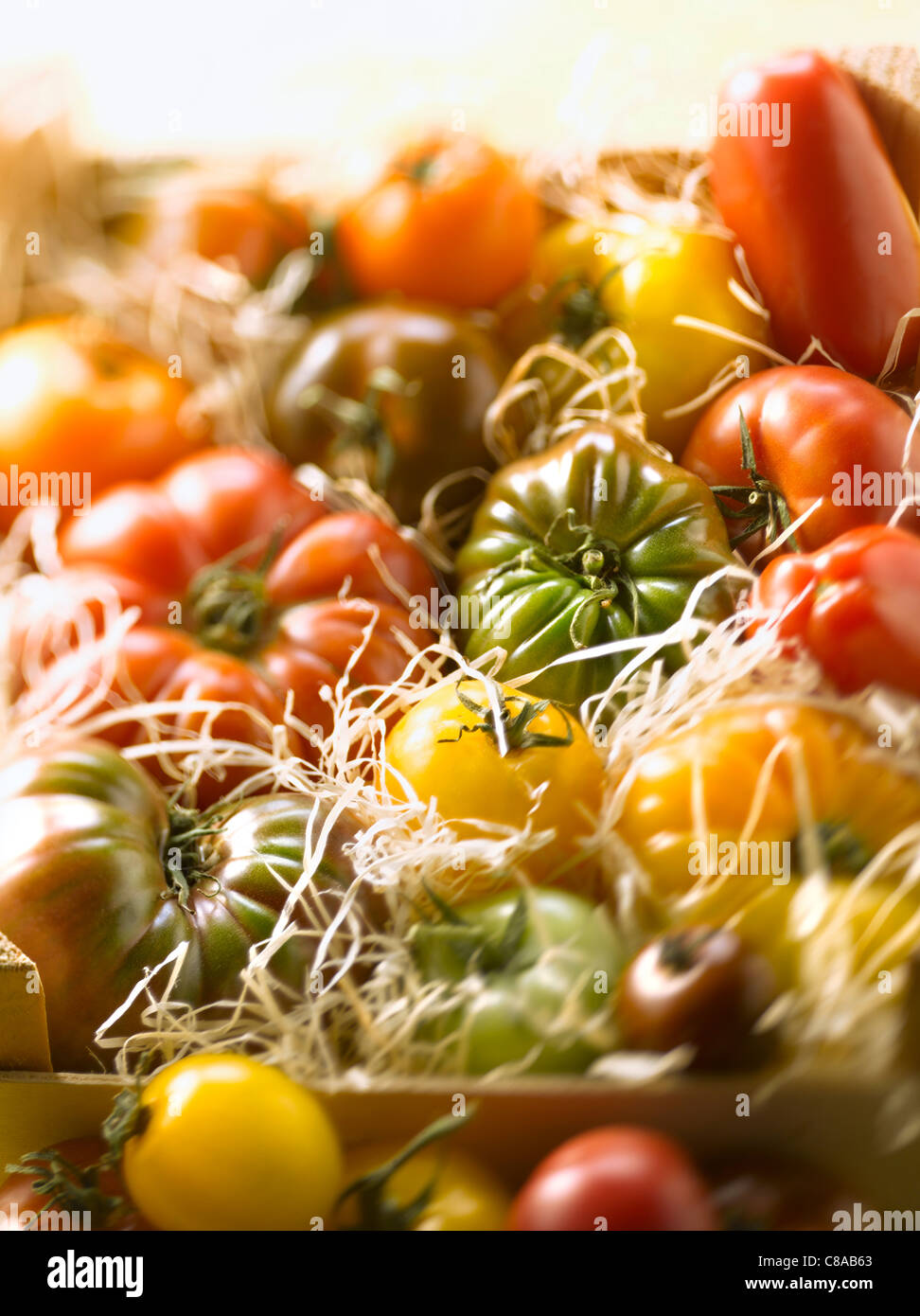 Crate of old-fashionned tomatoes Stock Photo - Alamy