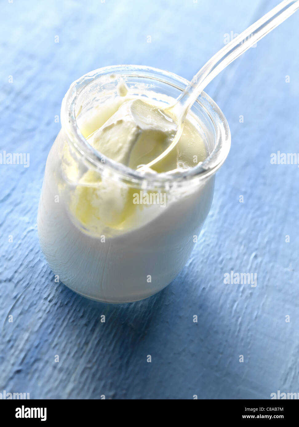 Yoghurt in a glass pot Stock Photo - Alamy