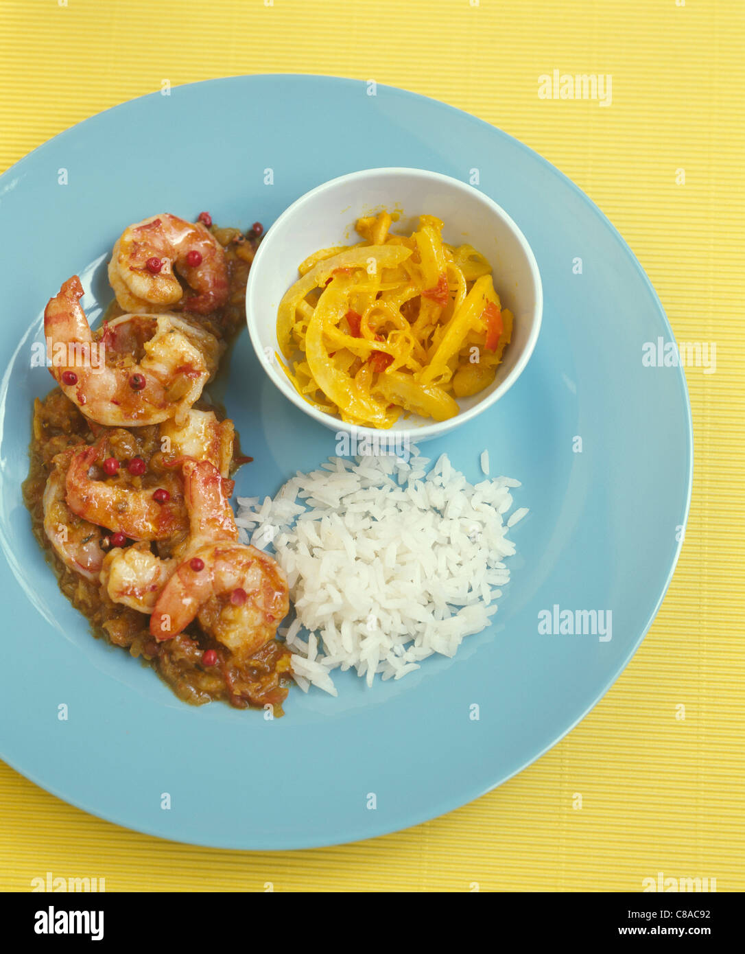Shrimp and pink peppercorn Cari,rice and lemon Achar Stock Photo - Alamy