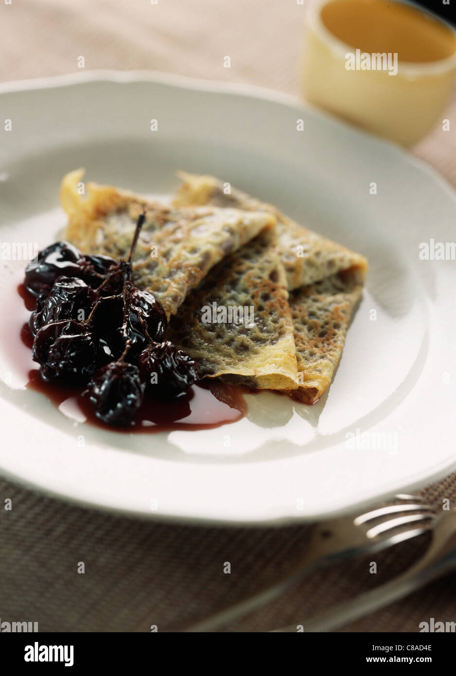 Pancakes with Anko paste and roasted red grape sauce Stock Photo - Alamy