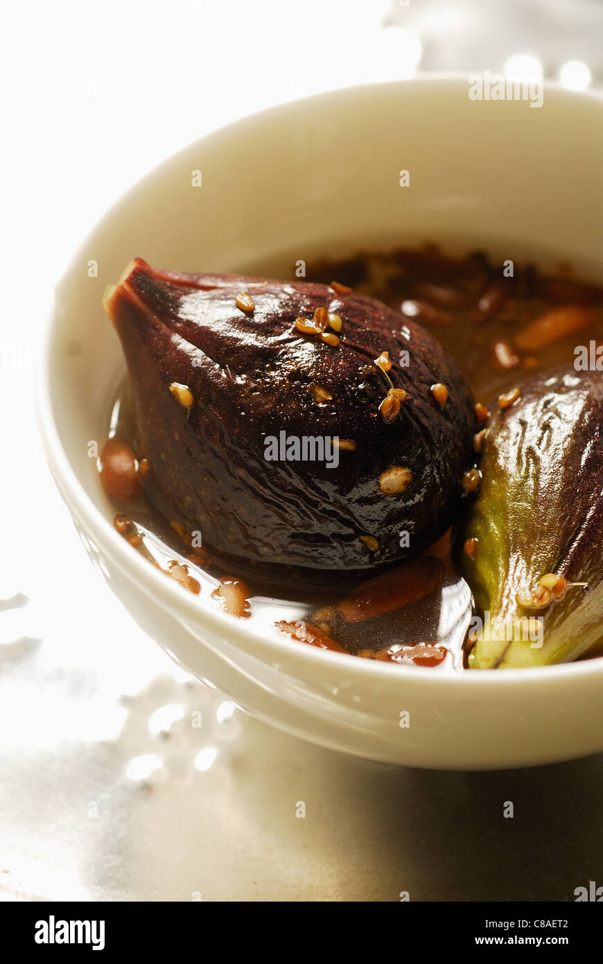 Fig in syrup hi-res stock photography and images - Alamy