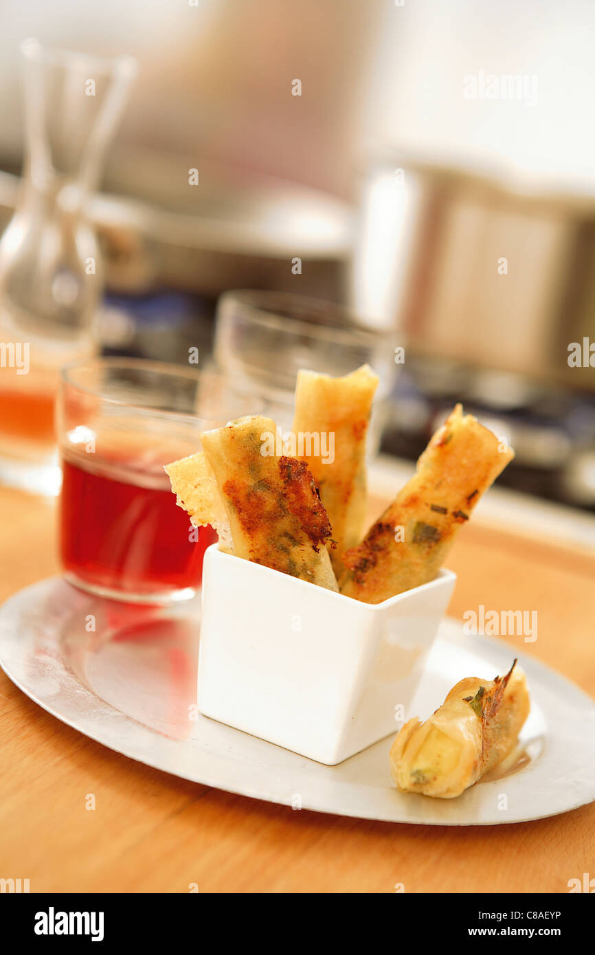 Spicy vegetable crunchy filo pastry cigars Stock Photo - Alamy