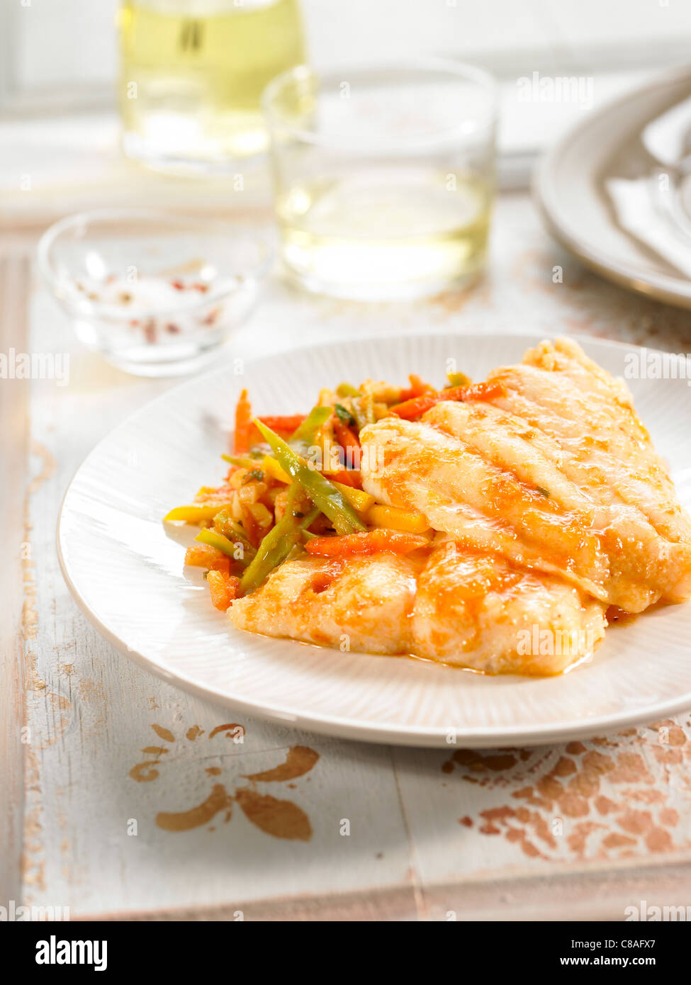 Panga fish fillets with vegetables Stock Photo - Alamy