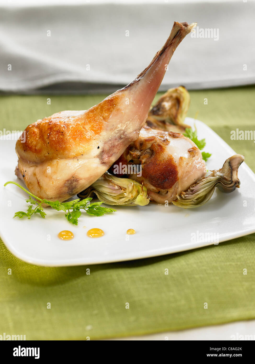 Honey-flavored grilled rabbit Stock Photo - Alamy