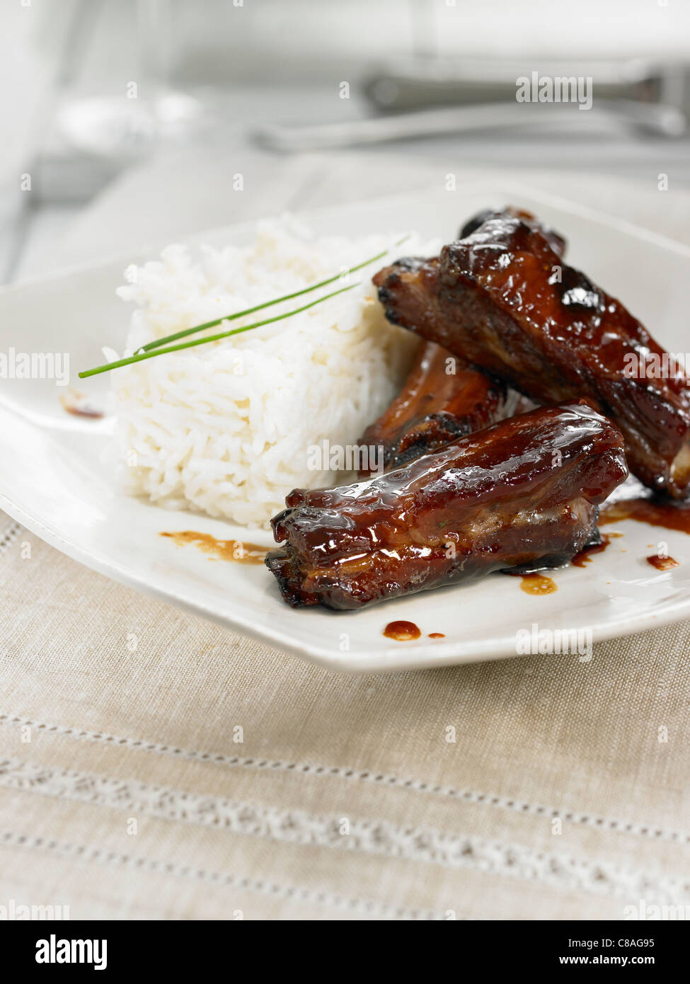 Spare ribs caramelized with honey Stock Photo - Alamy