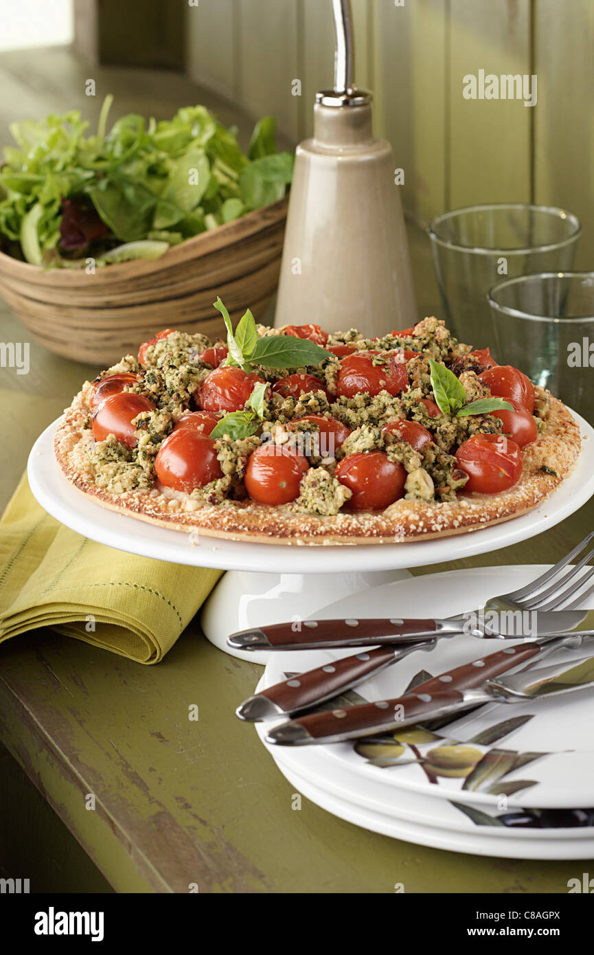 Pizza with pesto crumble Stock Photo - Alamy